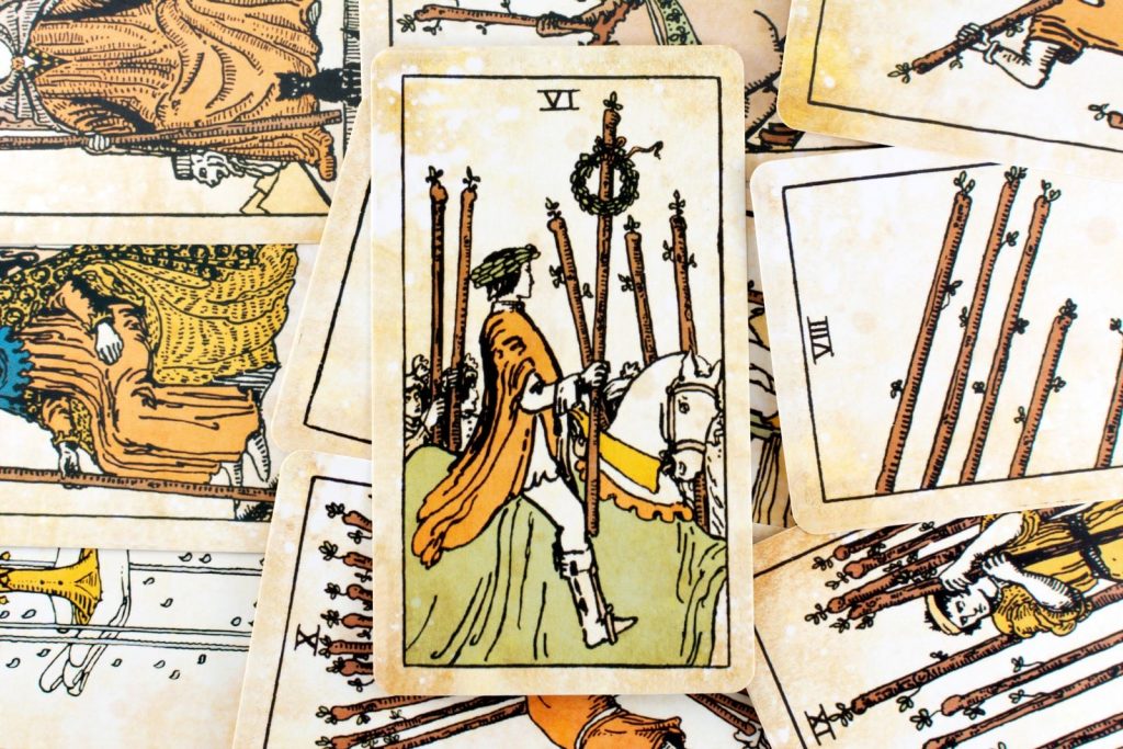 Seven of Wands Tarot Card Meaning - Joyful Mystic